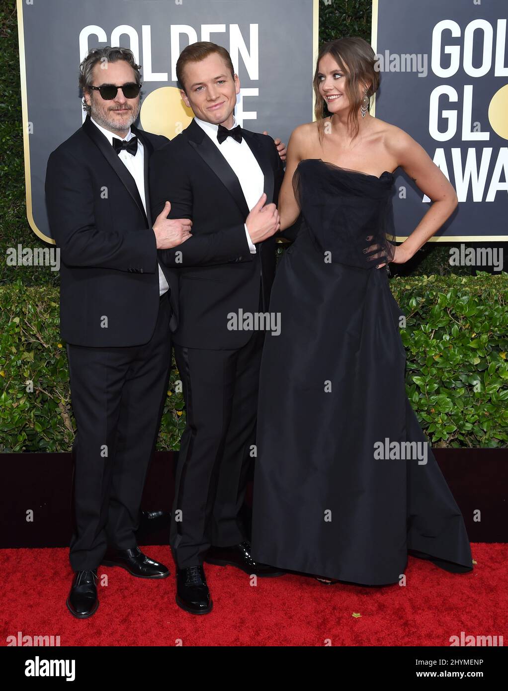 Joaquin Phoenix, Taron Eggerton and Emily Robinson at the 77th Golden ...