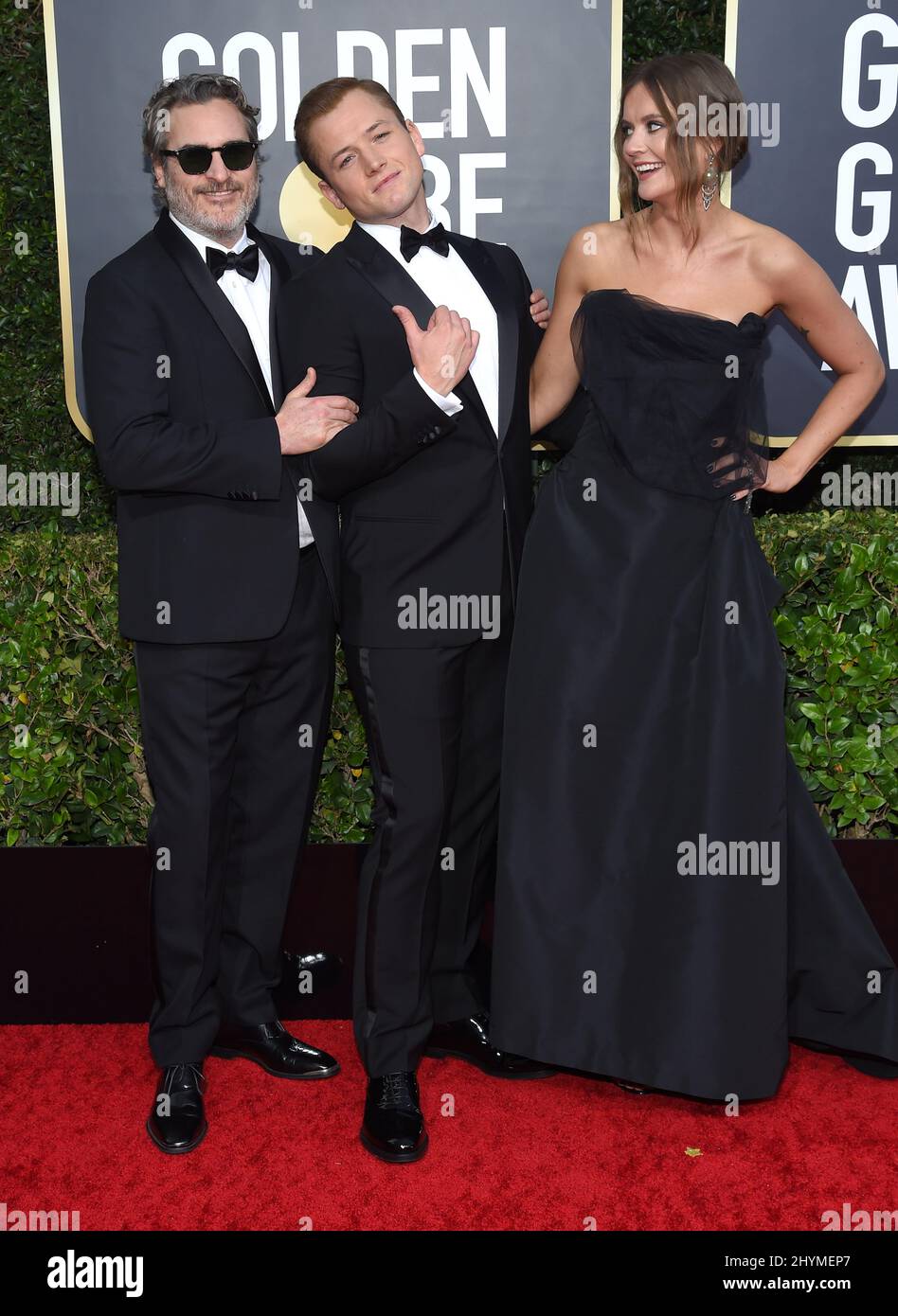 Joaquin Phoenix, Taron Eggerton and Emily Robinson at the 77th Golden ...