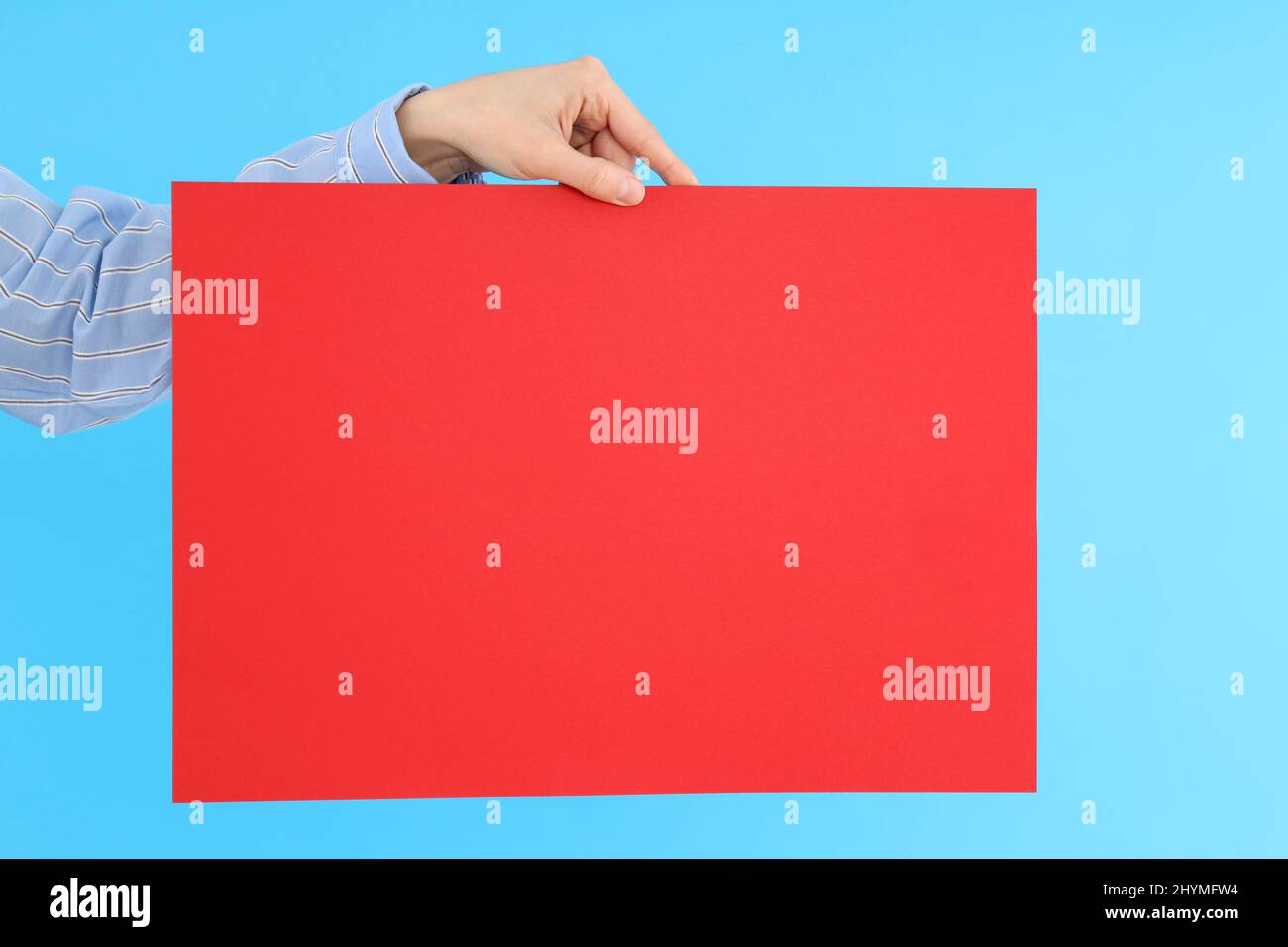 Hand holding blank banner hi-res stock photography and images - Alamy