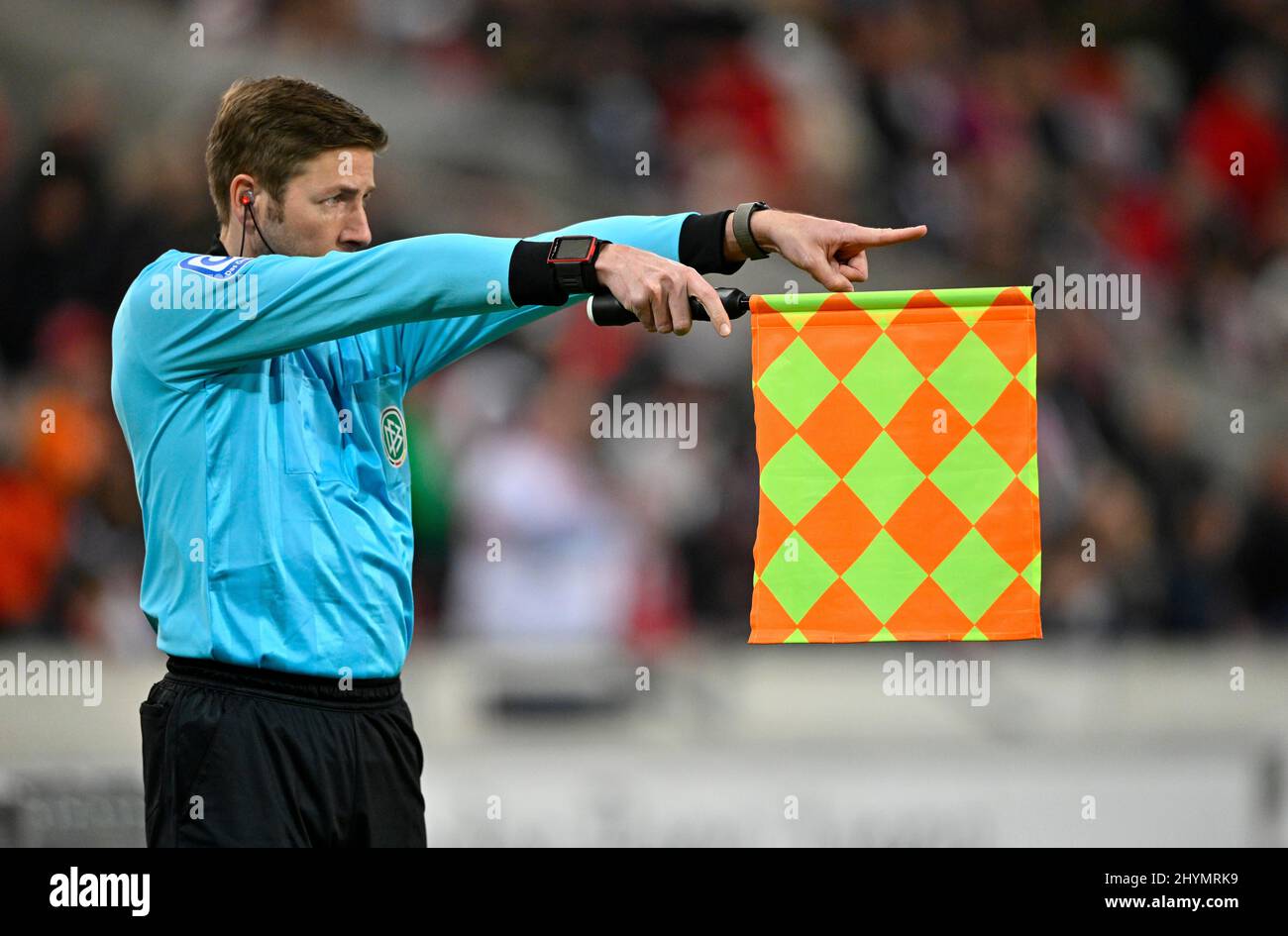 Linesman with flag, showing offside, Mercedes-Benz Arena, Stuttgart ...