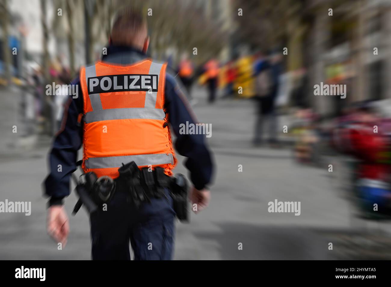 Zoom effect, policeman patrol Stock Photo - Alamy