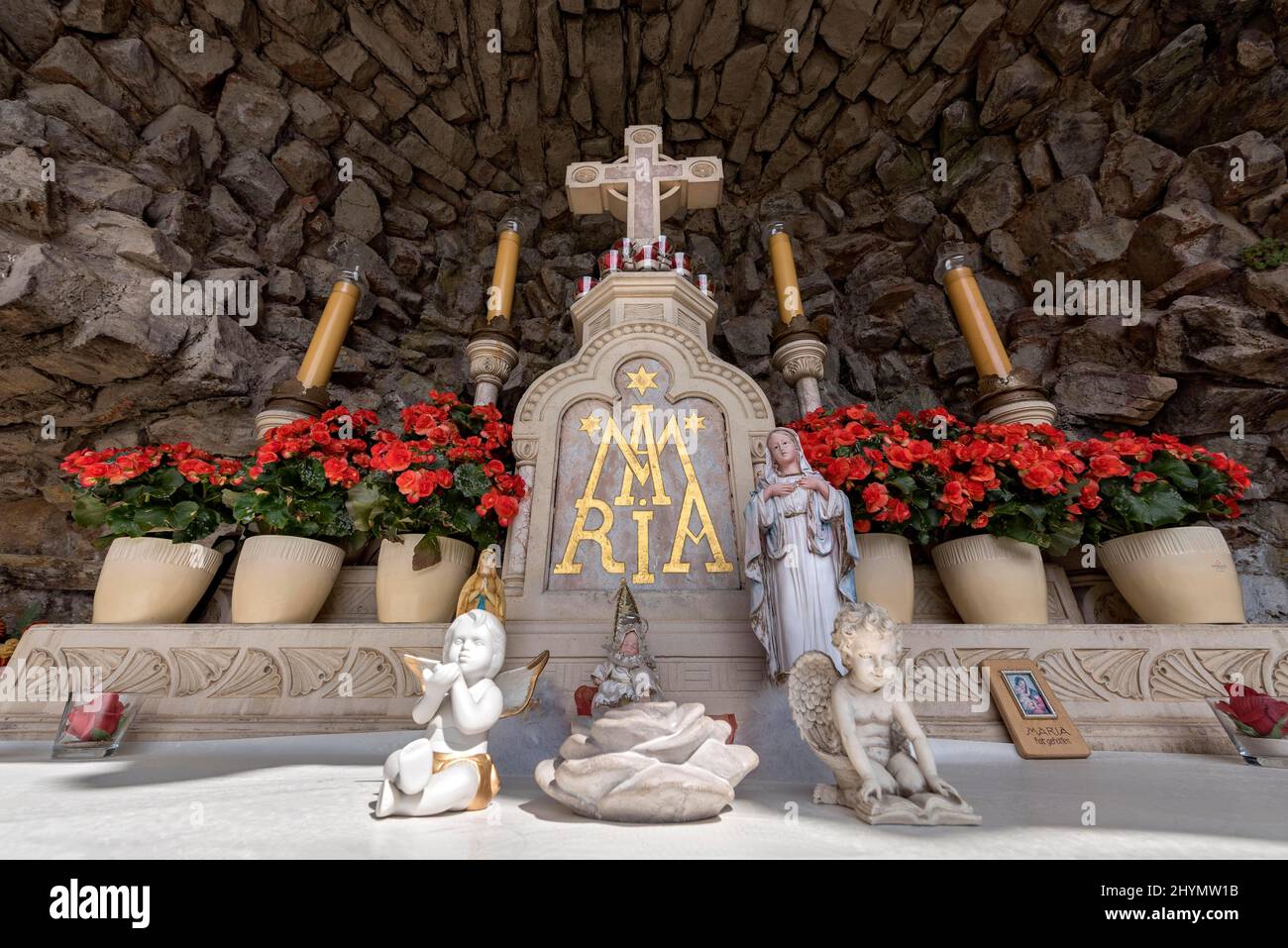 Altar with Christ cross, Mary figure, Jesus figure and angel figures in ...