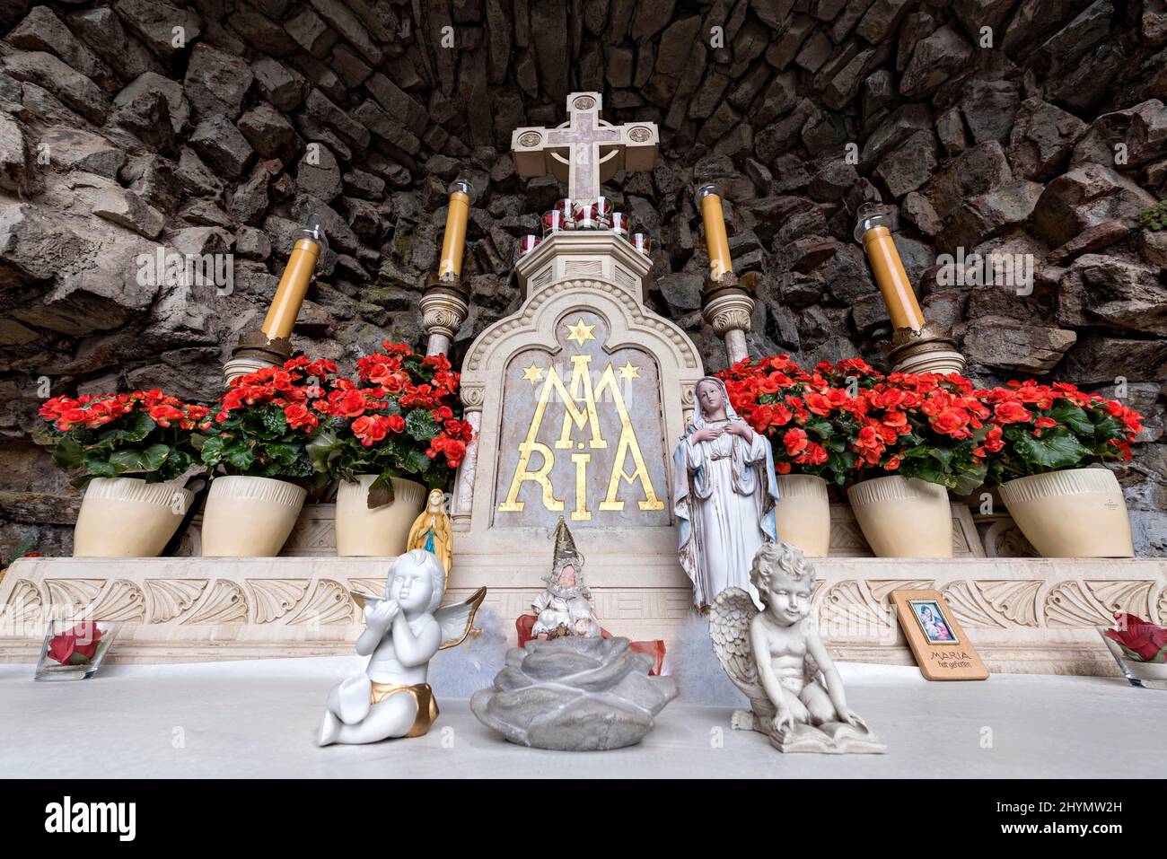 Altar with Christ cross, Mary figure, Jesus figure and angel figures in ...