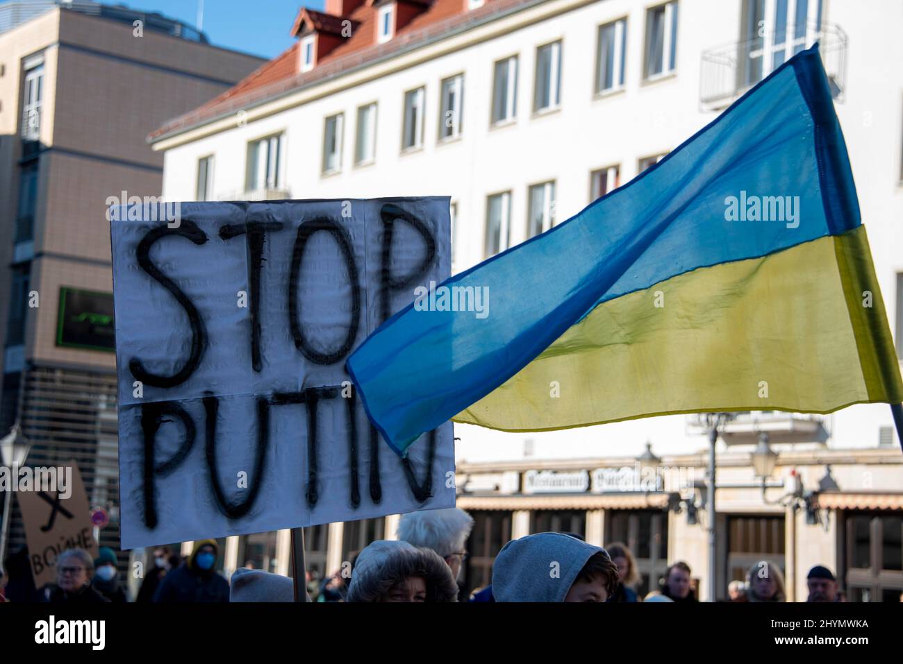 Protest poster with the inscription Stop Putin, Ukrainian flag ...