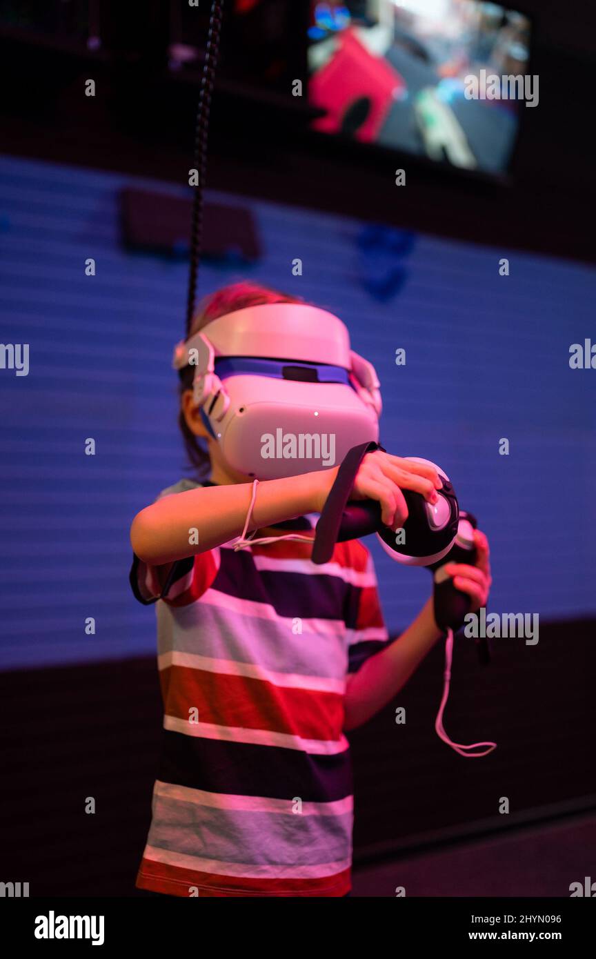 vr game and virtual reality. kid boy gamer six years old fun playing on ...