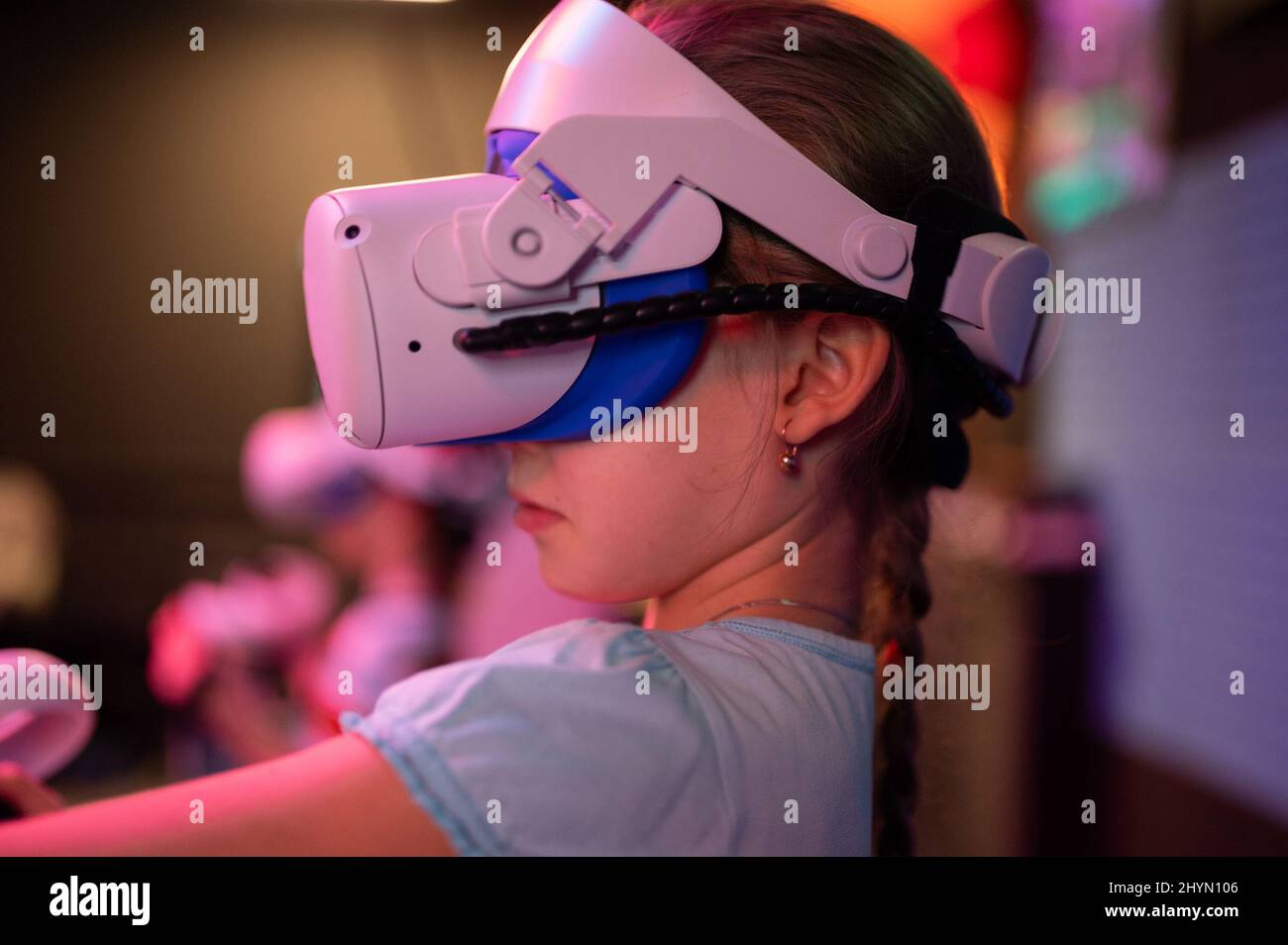 vr game and virtual reality. kid girl gamer eight years old fun playing ...