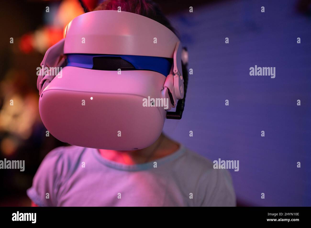 vr game and virtual reality. kid girl gamer eight years old fun playing ...