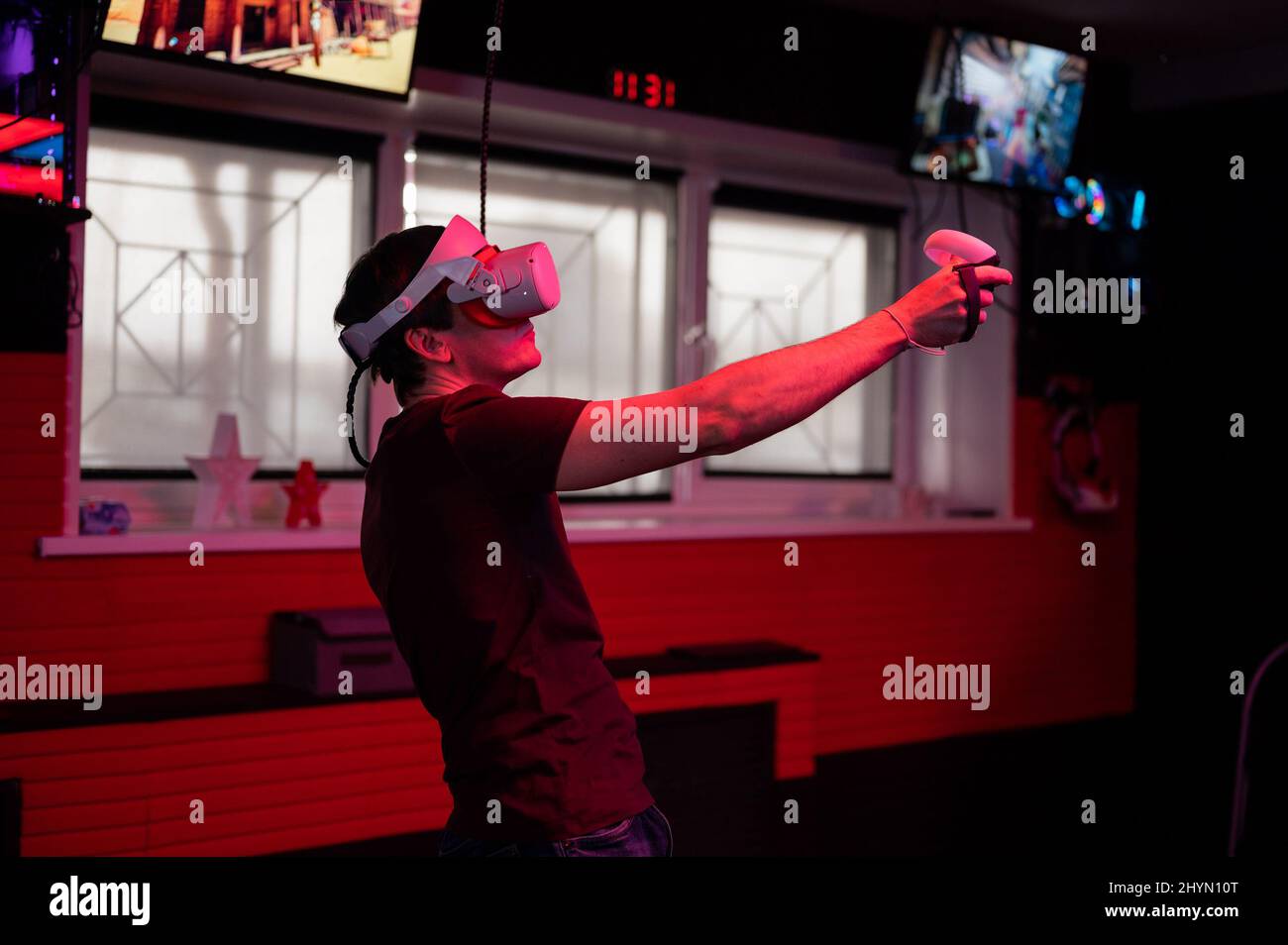 vr game and virtual reality. man gamer fun playing on futuristic ...