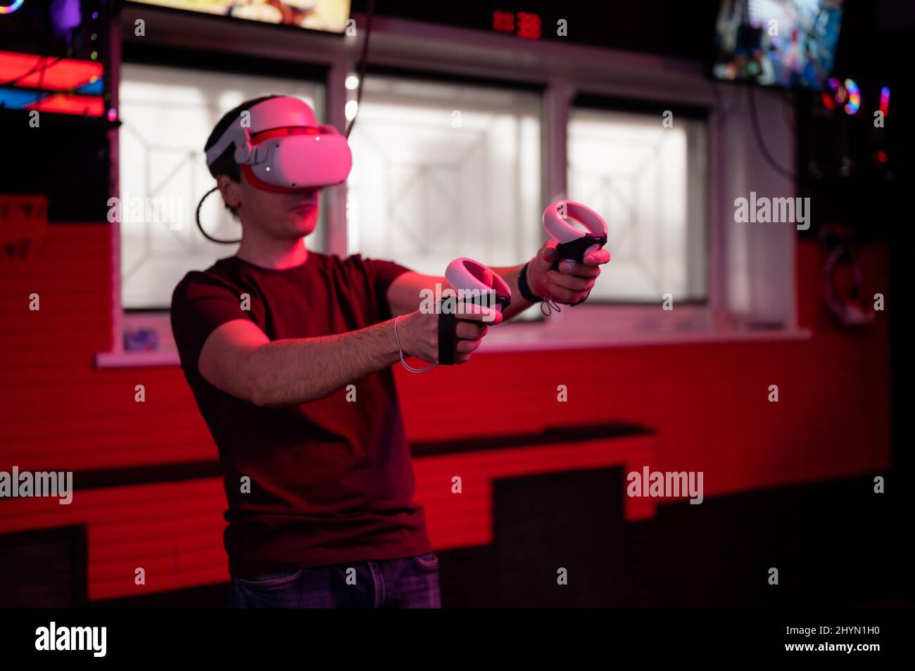 vr game and virtual reality. man gamer fun playing on futuristic ...