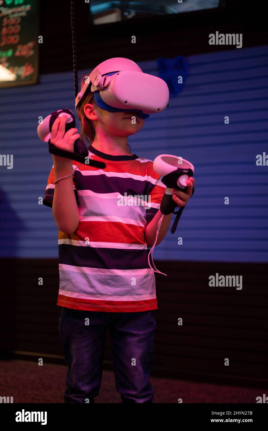 vr game and virtual reality. kid boy gamer six years old fun playing on ...