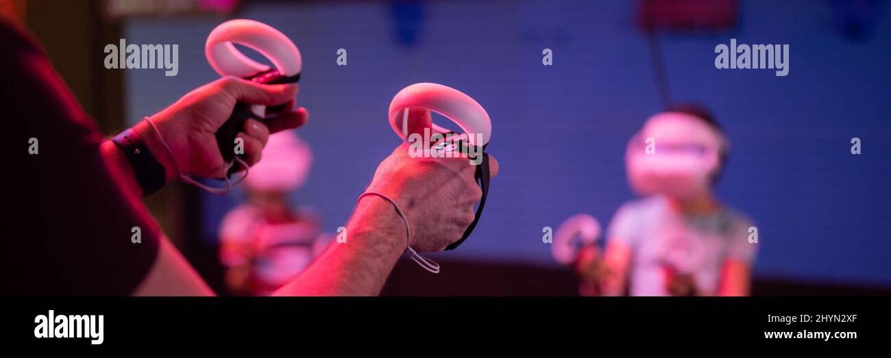 vr game and virtual reality. team family dad and kids gamers fun ...