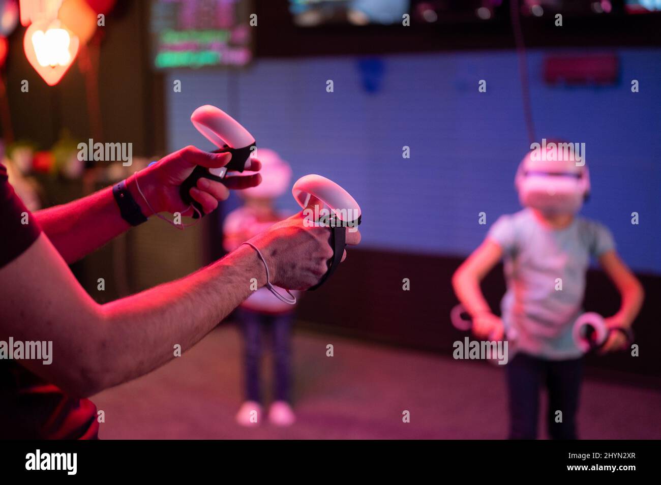 vr game and virtual reality. team family dad and kids gamers fun ...