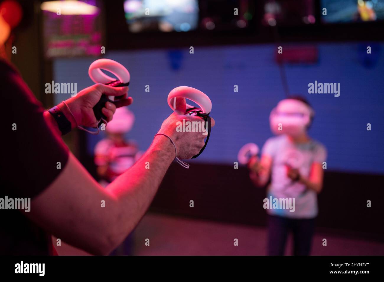 vr game and virtual reality. team family dad and kids gamers fun ...