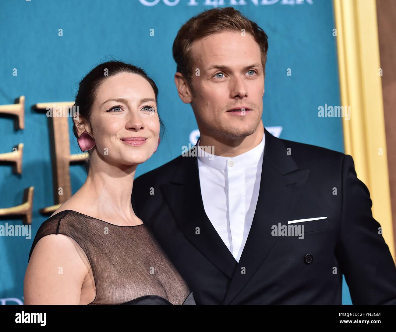 Caitriona Balfe and Sam Heughan attending the season five premiere of ...
