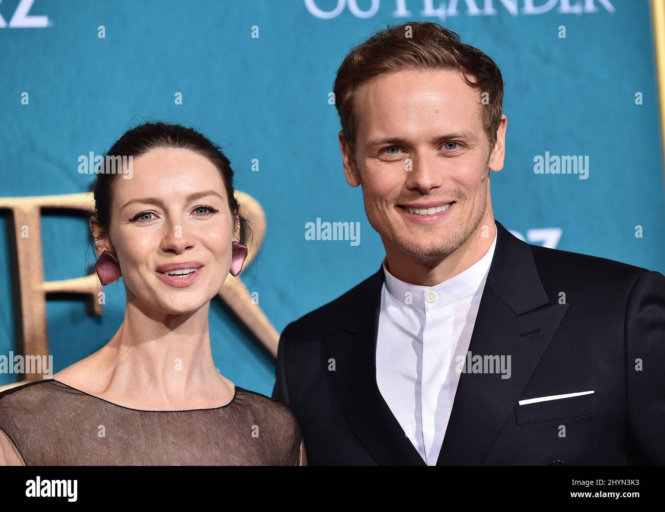 Caitriona Balfe and Sam Heughan attending the season five premiere of ...