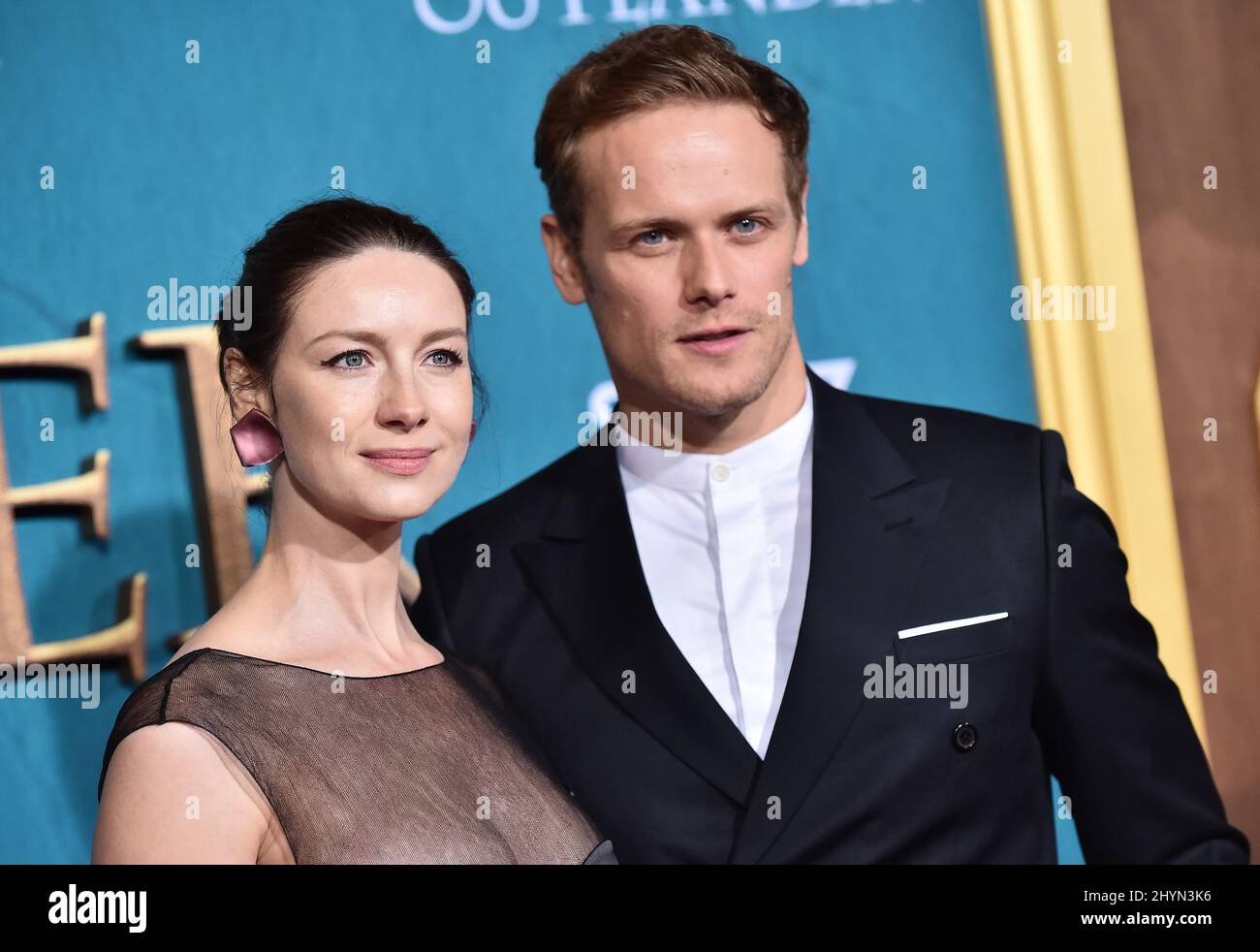 Caitriona Balfe and Sam Heughan attending the season five premiere of ...