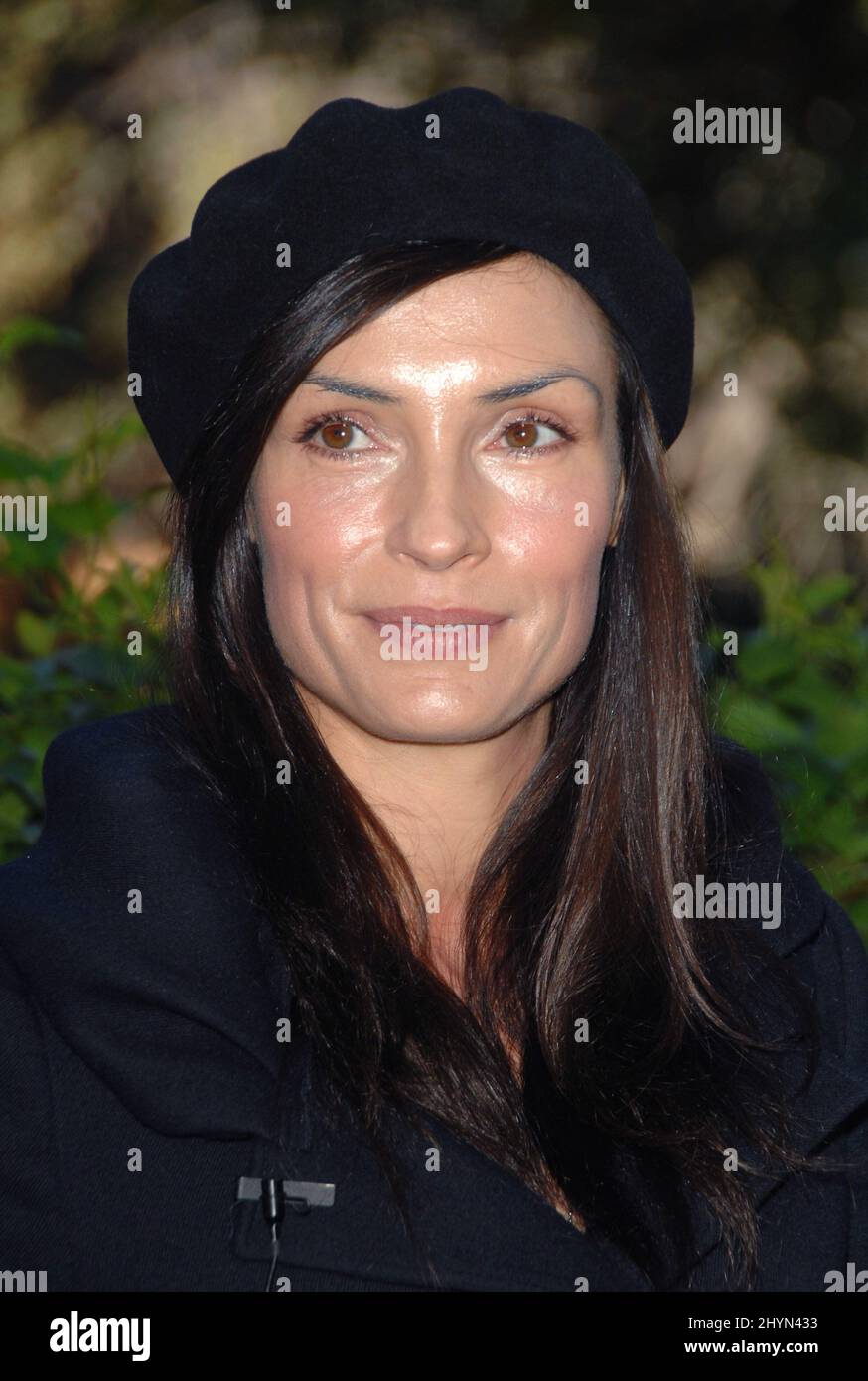Famke Janssen unveils PETA's 'Be An Angel For Animals' advert in Los ...