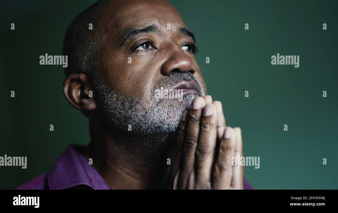 Person praying god brazilian man hi-res stock photography and images ...