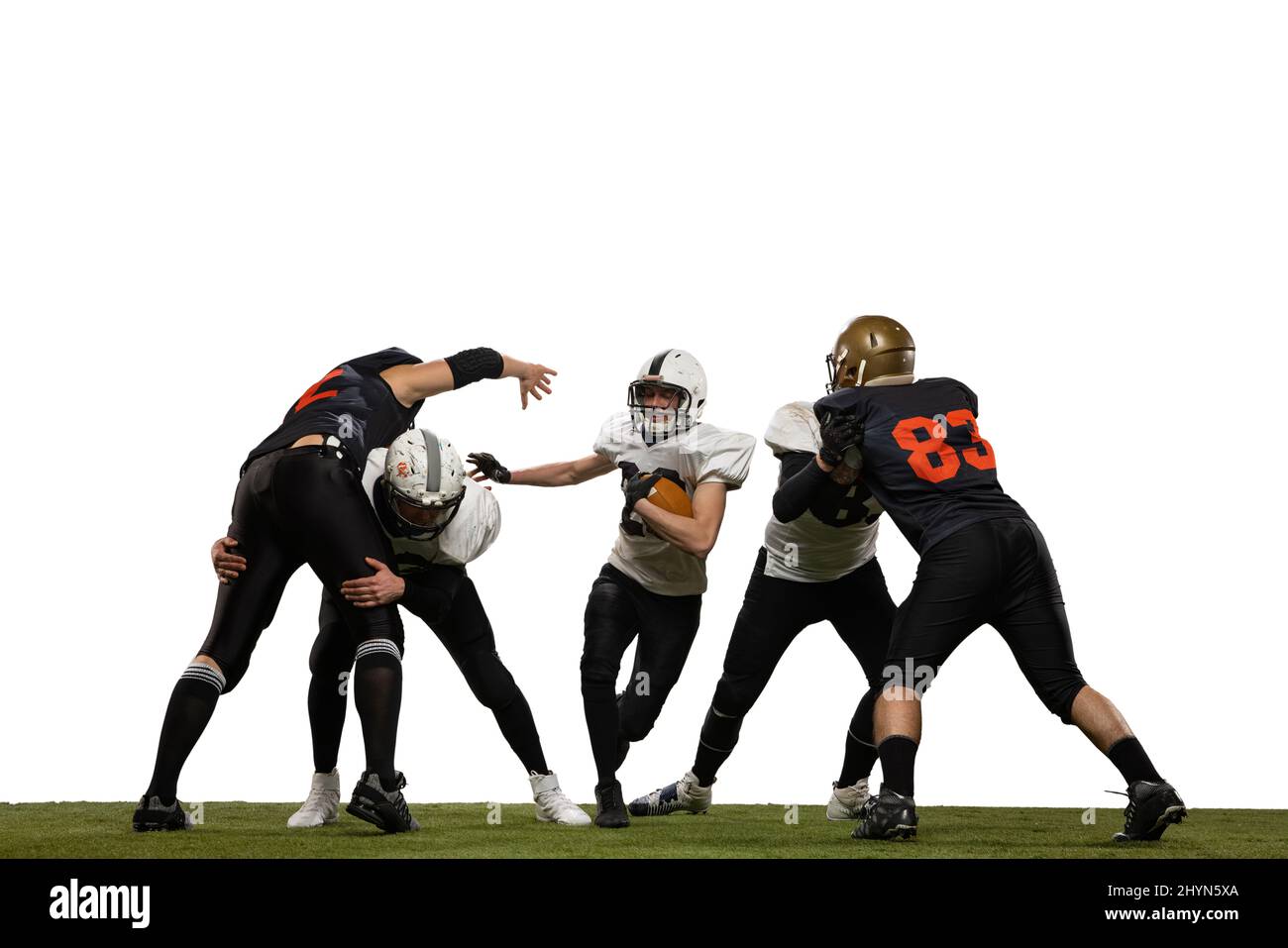 Fight for ball. Group of young sportive men, professional american ...