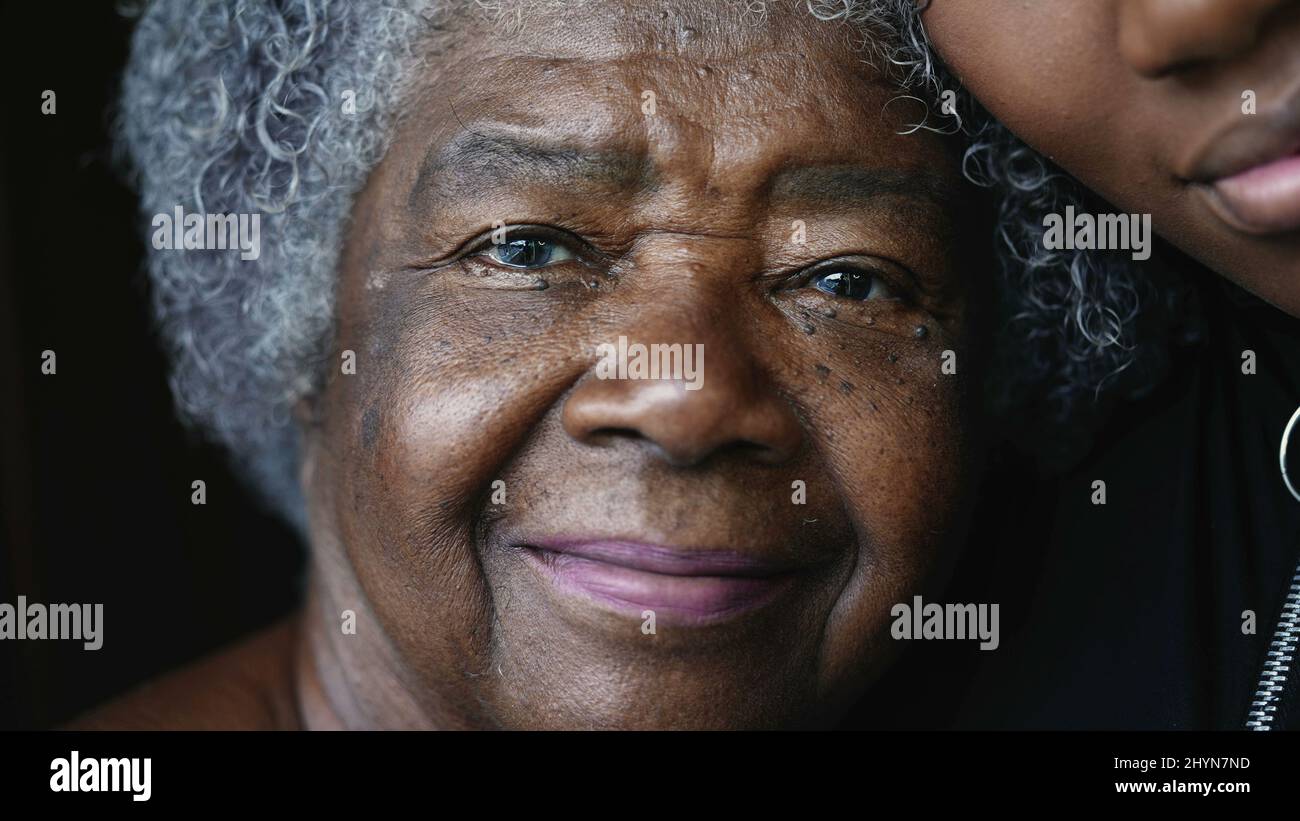 Generational women portrait faces a grandmother and granddaughter ...