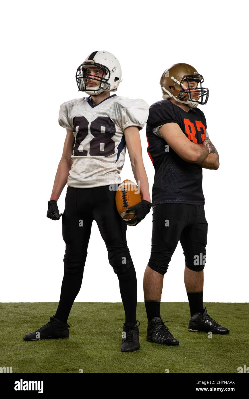 Portrait of two professional american football players in sports ...