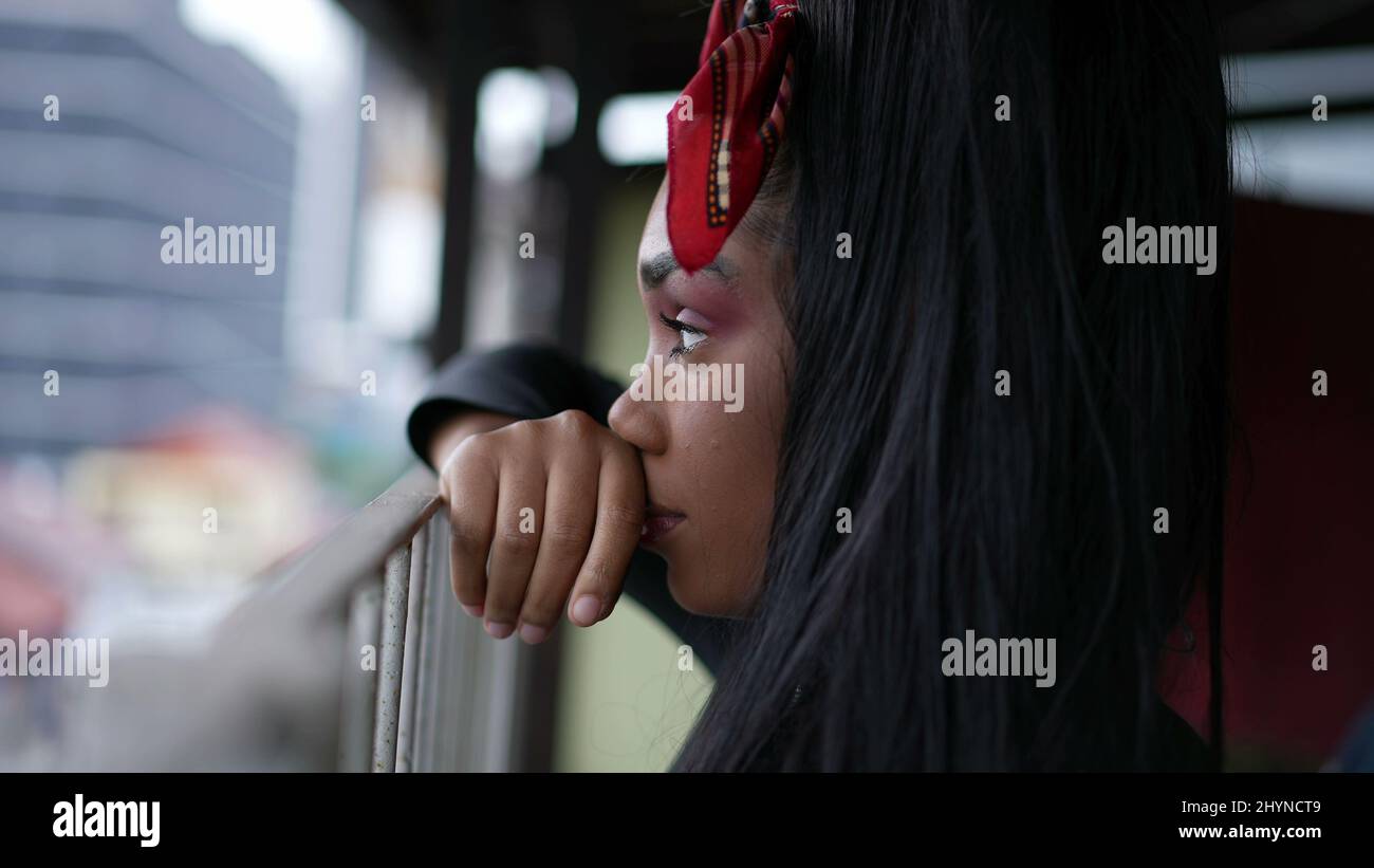 A thoughtful teenager girl staring outside thinking Stock Photo - Alamy