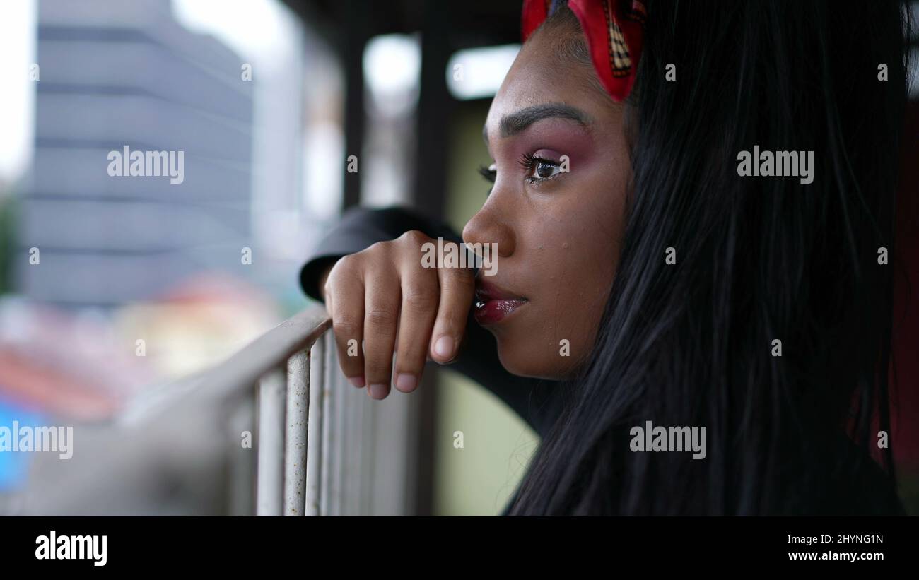 Teenager staring out window hi-res stock photography and images - Alamy