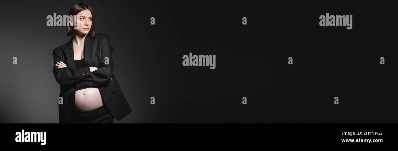 Trendy Pregnant Woman Crossing Arms Isolated On Dark Grey Banner Stock