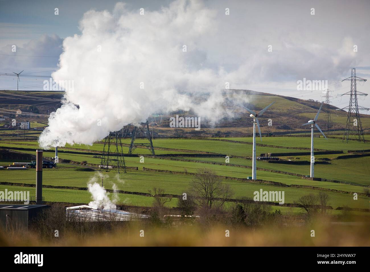 Waste steam pumps out of Robinson and Mitchells factory chimney near ...