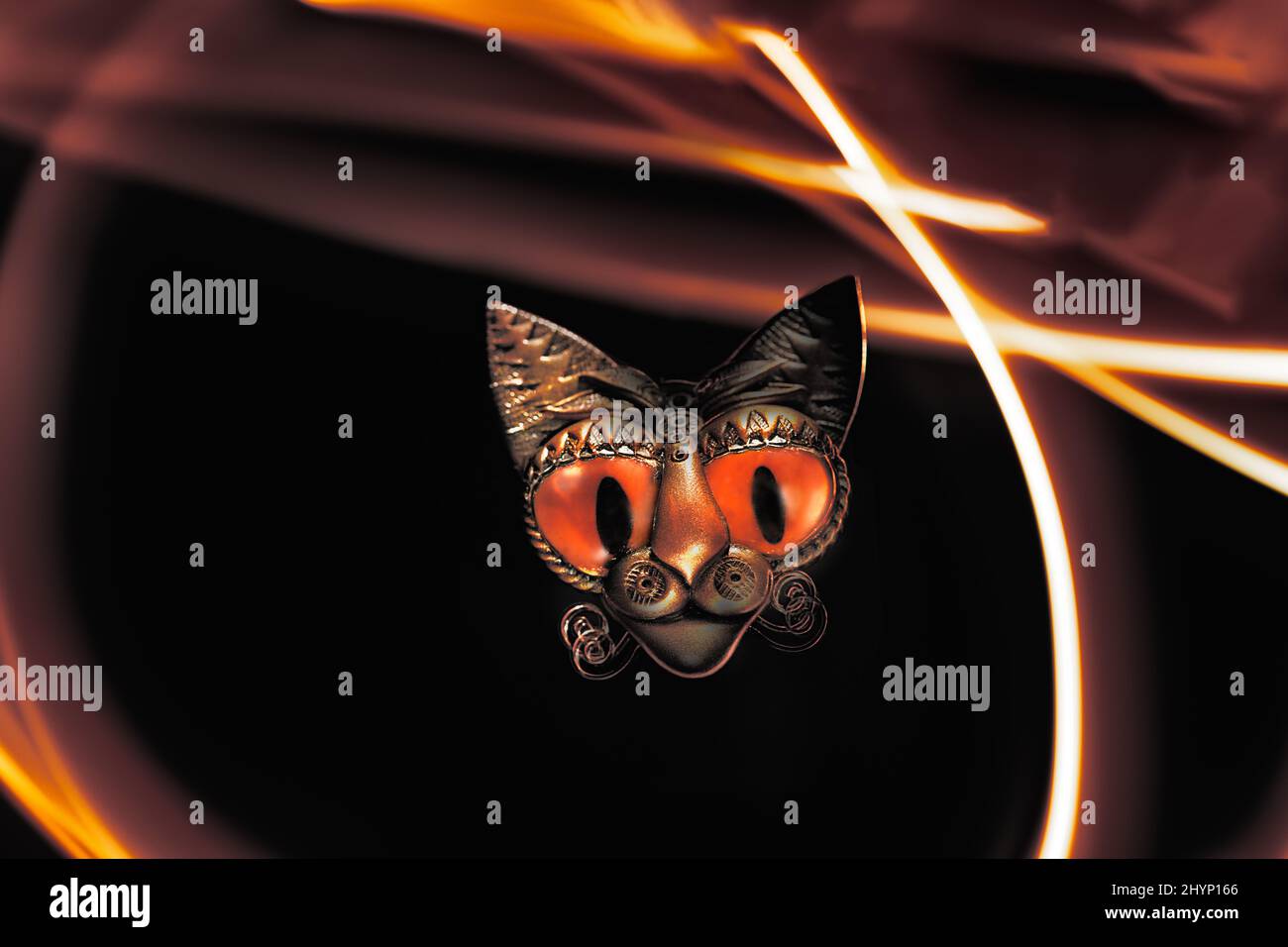 Handmade brooch in the form of a cat with large glass eyes of orange ...