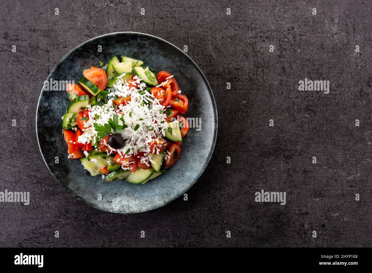 Traditional Bulgarian shopska salad with tomato,cucumber and bulgarian ...