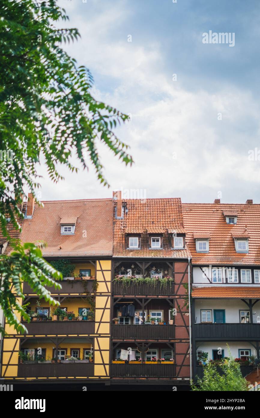 Vertical of antique buildings near the Kramerbrucke bridge in Erfurt ...