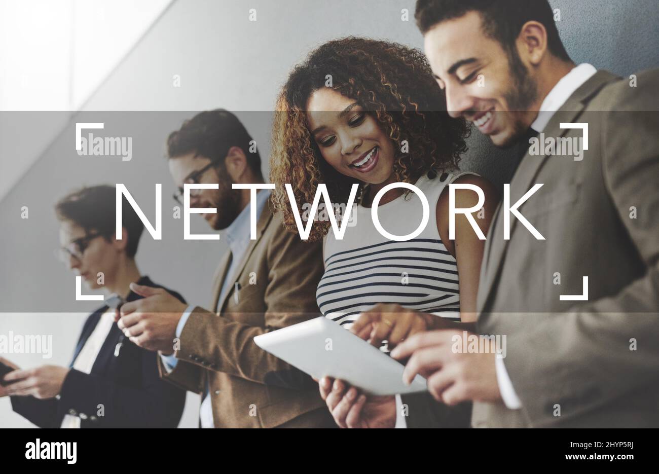 Reaching a larger audience. Shot of a businesspeople using wireless ...