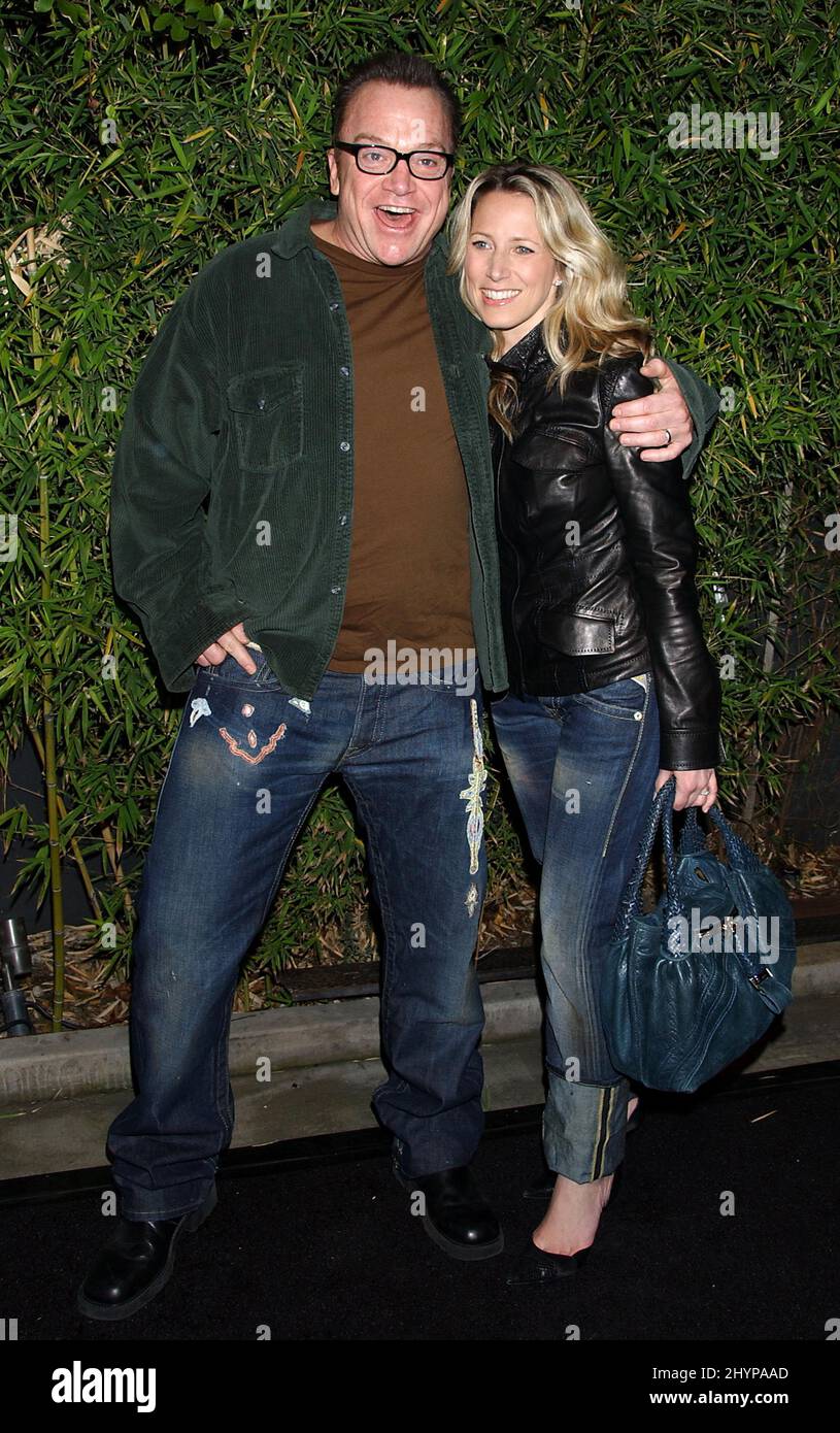 Tom Arnold & Shelby Roos attend the Brandon Davis Jean by Replay Launch ...