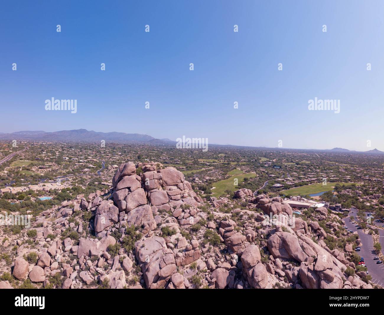 Beautiful desert covered with plants under he clear sky on a shot sunny ...