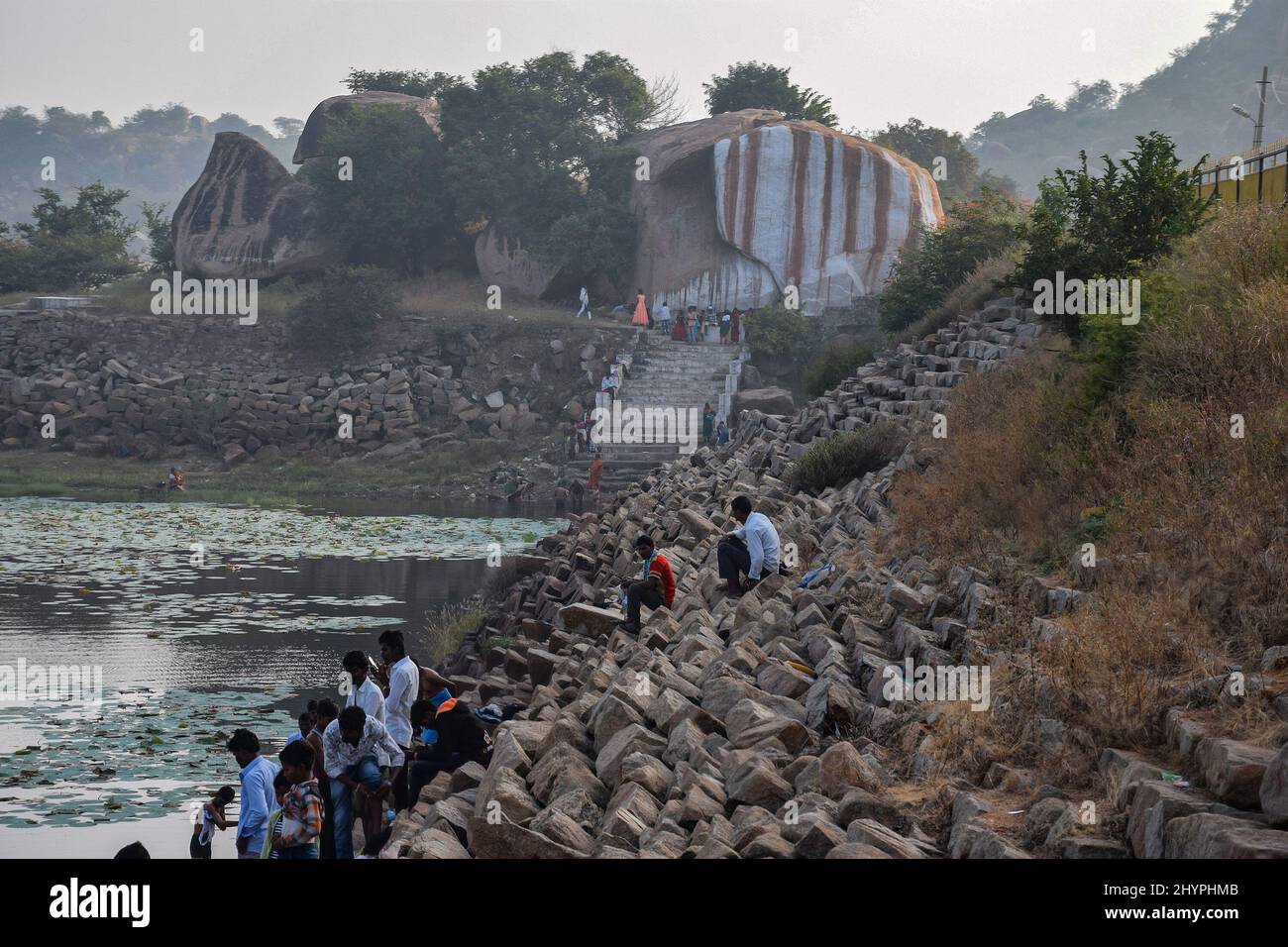 People taking ritual bath in the holy Bhima river bank near lord ...