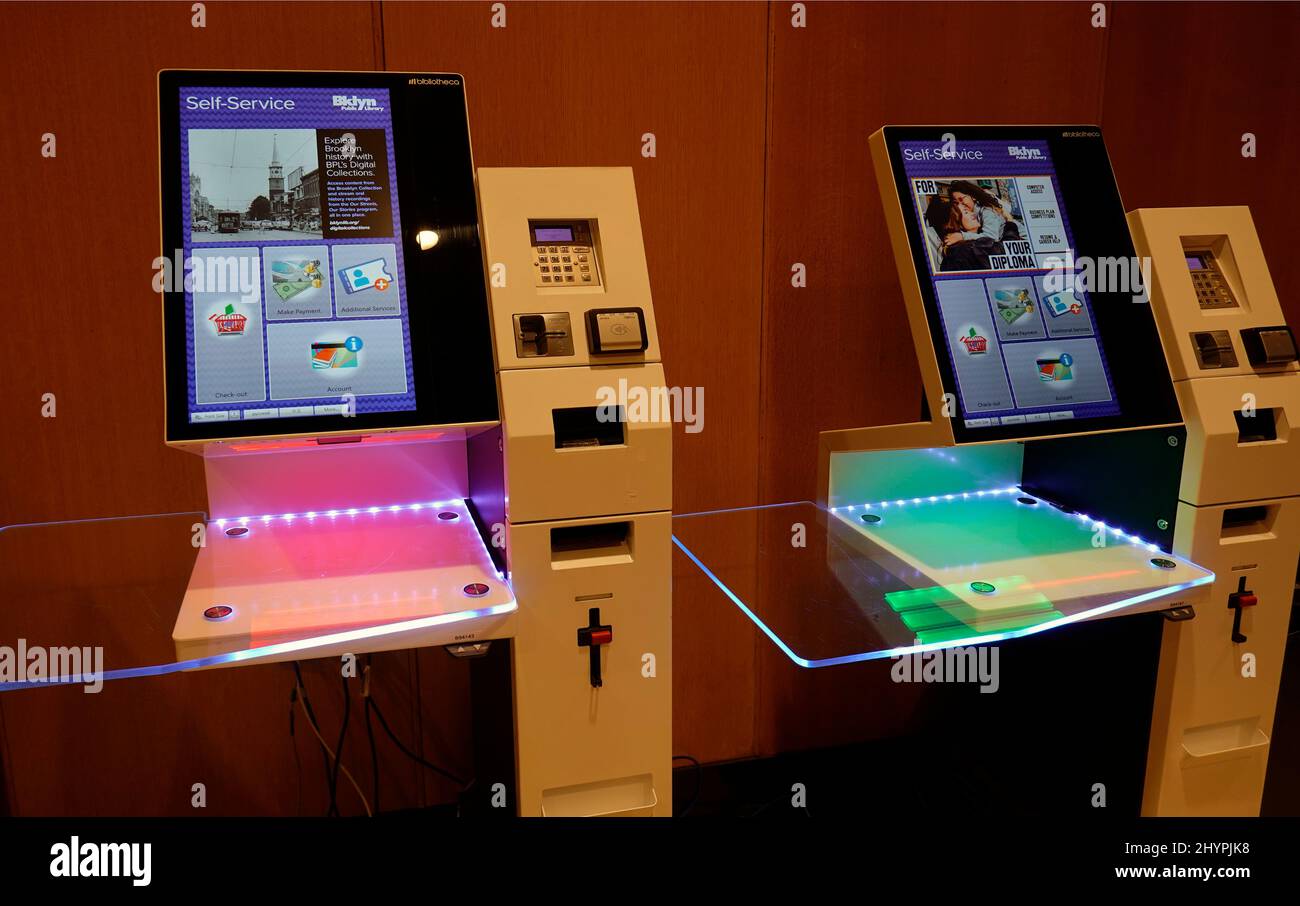 Self serve book check out stations hi-res stock photography and images ...