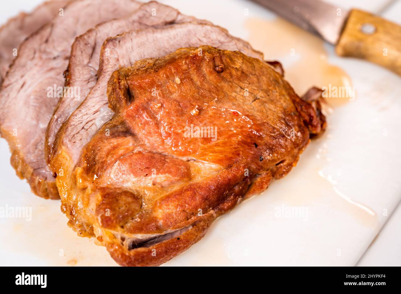 Fresh roasted pork neck, sliced to steak, baked until golden brown on ...