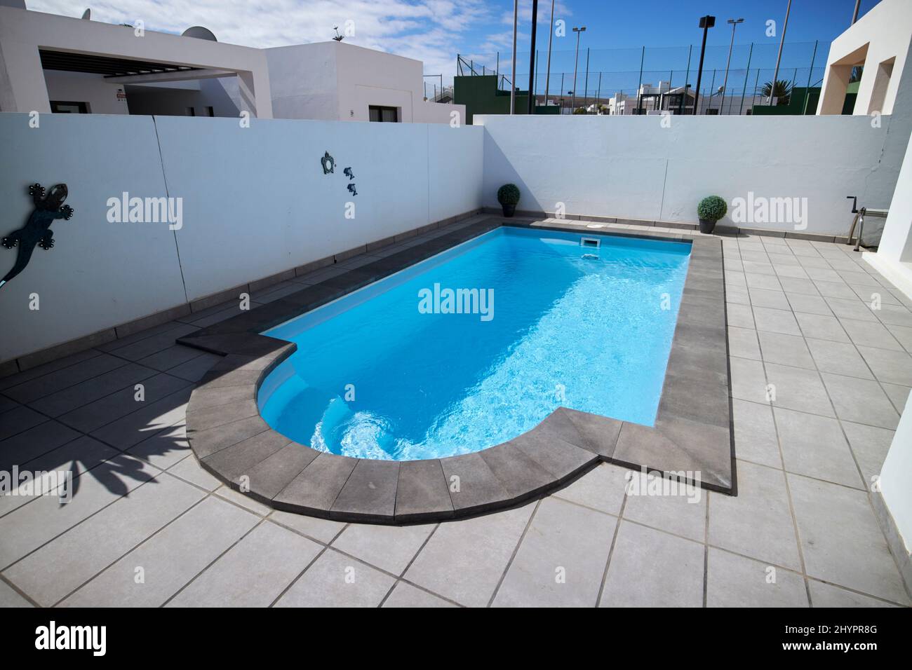 small private swimming pool of a villa in a residential complex playa ...