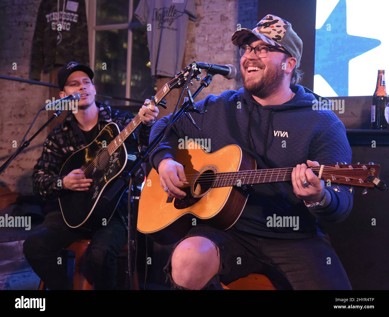 Devin Dawson and Mitchell Tenpenny on stage at the Whiskey Row Tornado ...