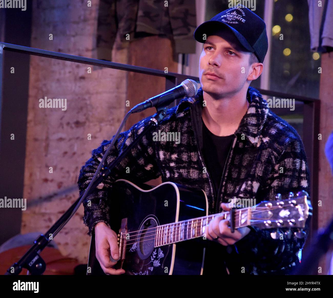 Devin Dawson on stage at the Whiskey Row Tornado Relief Concert Hosted ...