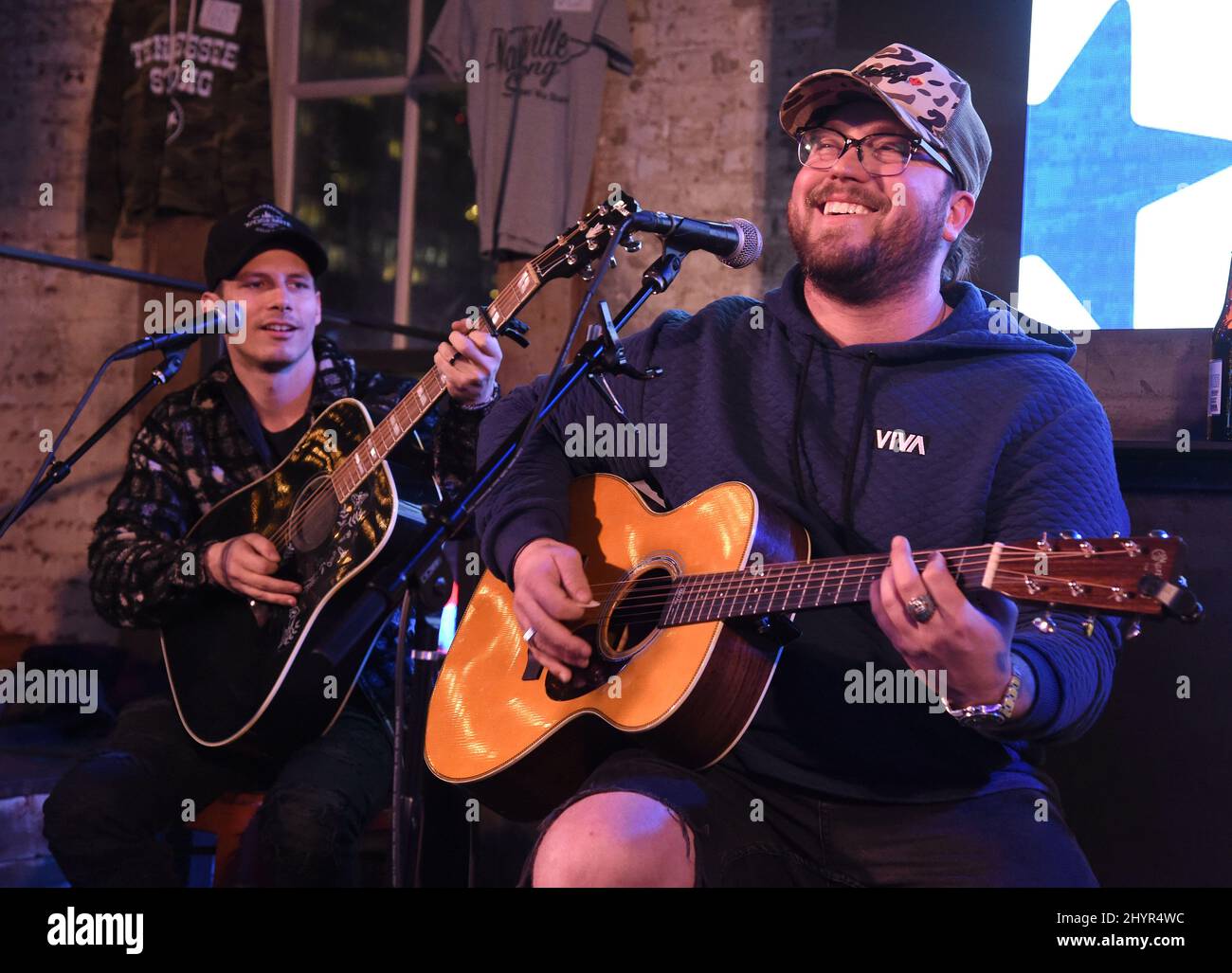 Devin Dawson and Mitchell Tenpenny on stage at the Whiskey Row Tornado ...