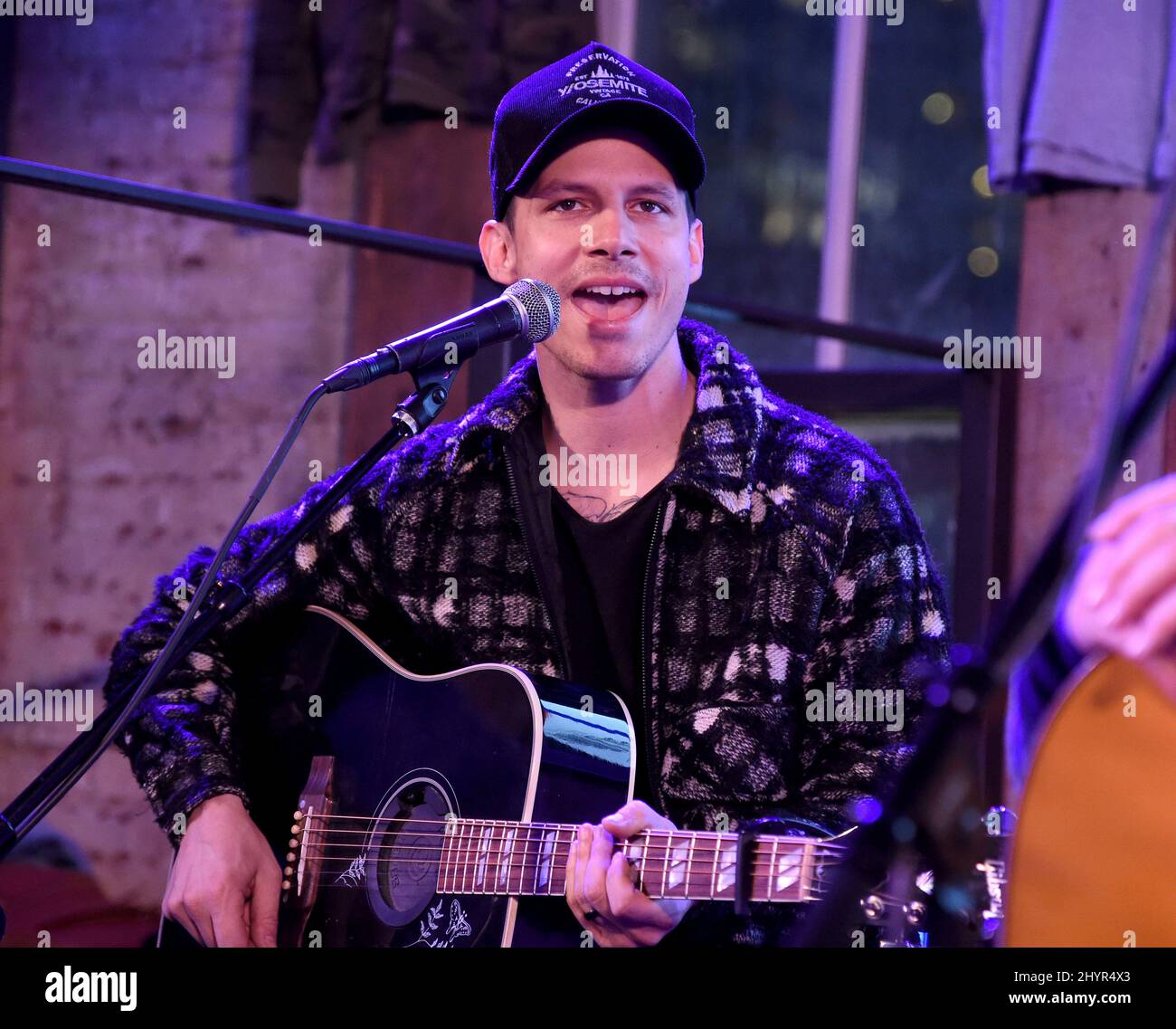 Devin Dawson on stage at the Whiskey Row Tornado Relief Concert Hosted ...