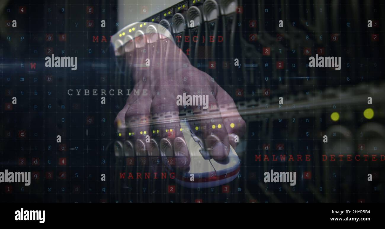 Image of cyber attack warning over hand of caucasian man in server room ...