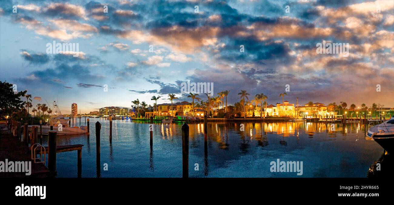 Lake Boca Raton and city skyline with reflections at sunset, panoramic ...