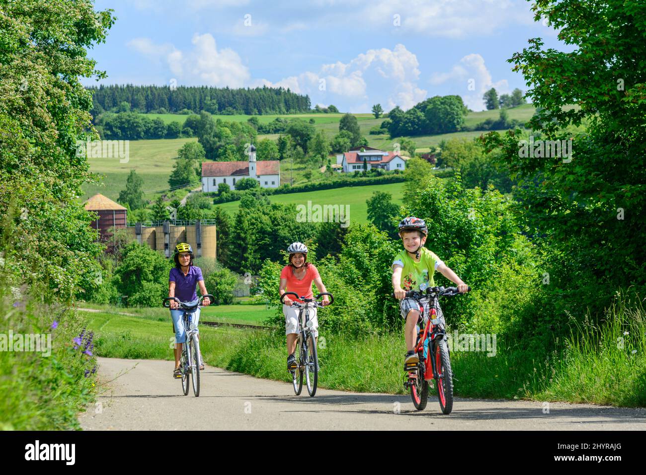 Group of young and elder people doing a cycling tour in beautiful ...