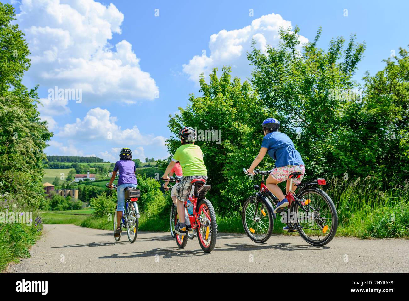 Group of young and elder people doing a cycling tour in beautiful ...