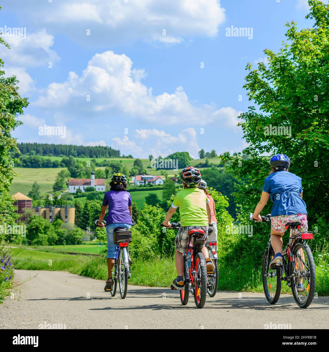 Group of young and elder people doing a cycling tour in beautiful ...
