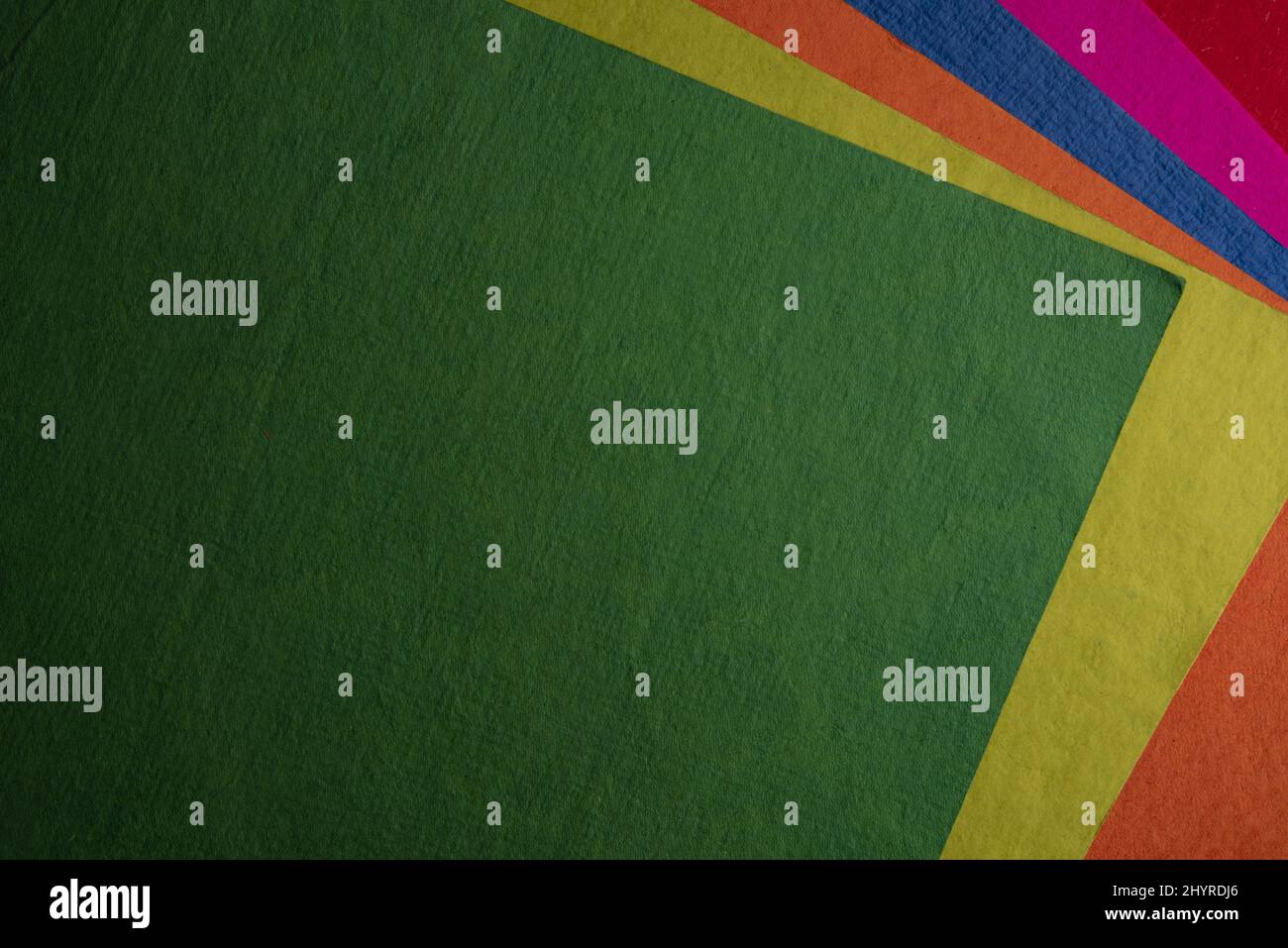 Colorful textured paper background design Stock Photo - Alamy