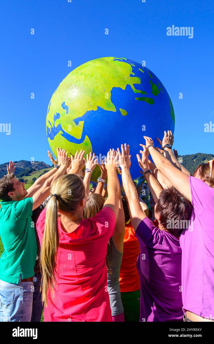 Let us carry the world on our hands Stock Photo - Alamy